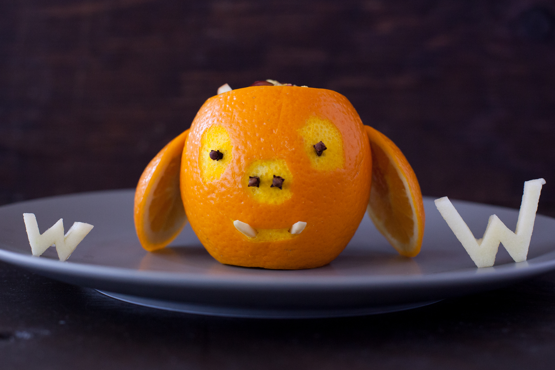 Carved Orange Warthog with Toddler Fruit Salad Too Cute to Resist
